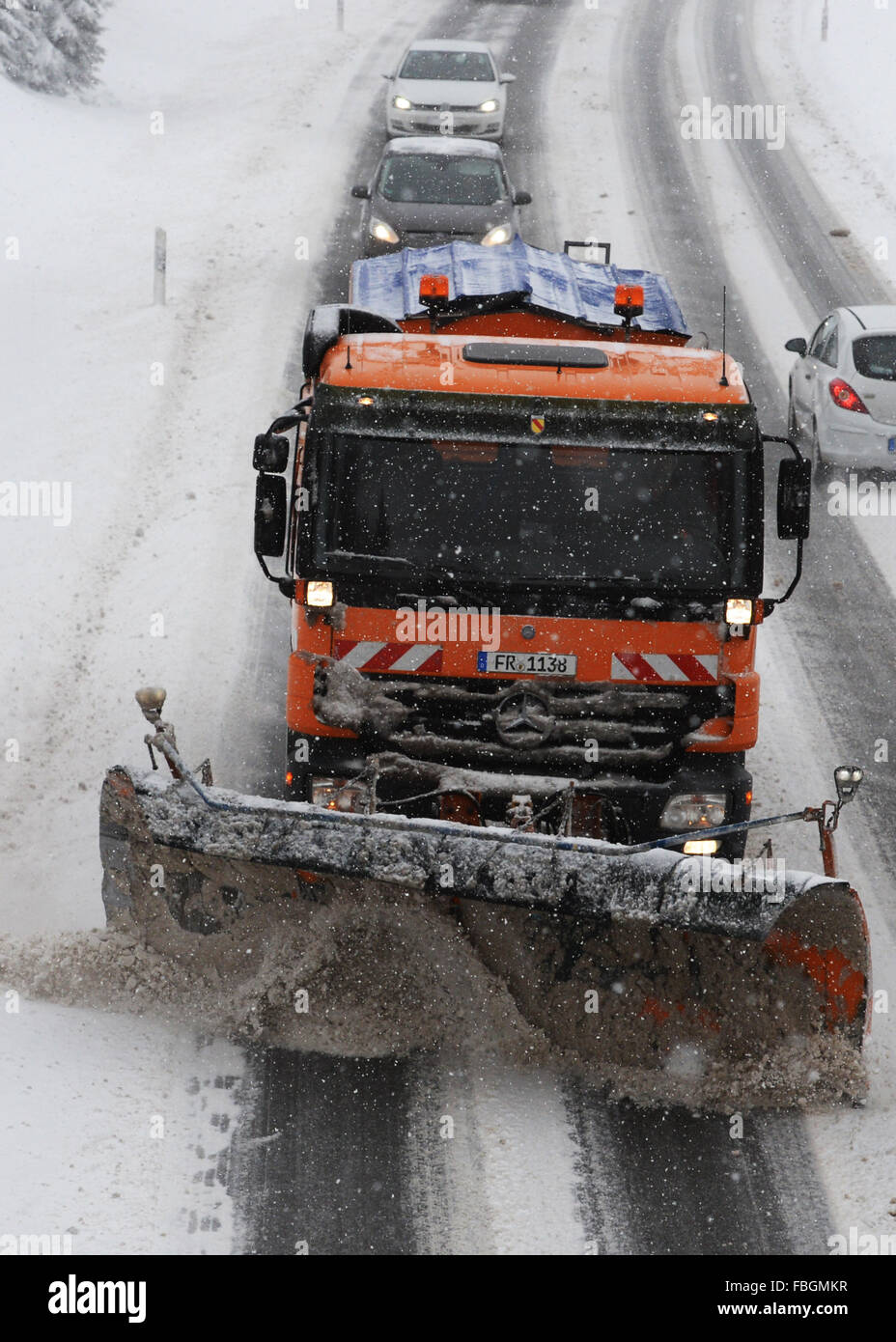 Hinterzarten, Germany. 16th Jan, 2016. A snow plow drives in a heavy ...