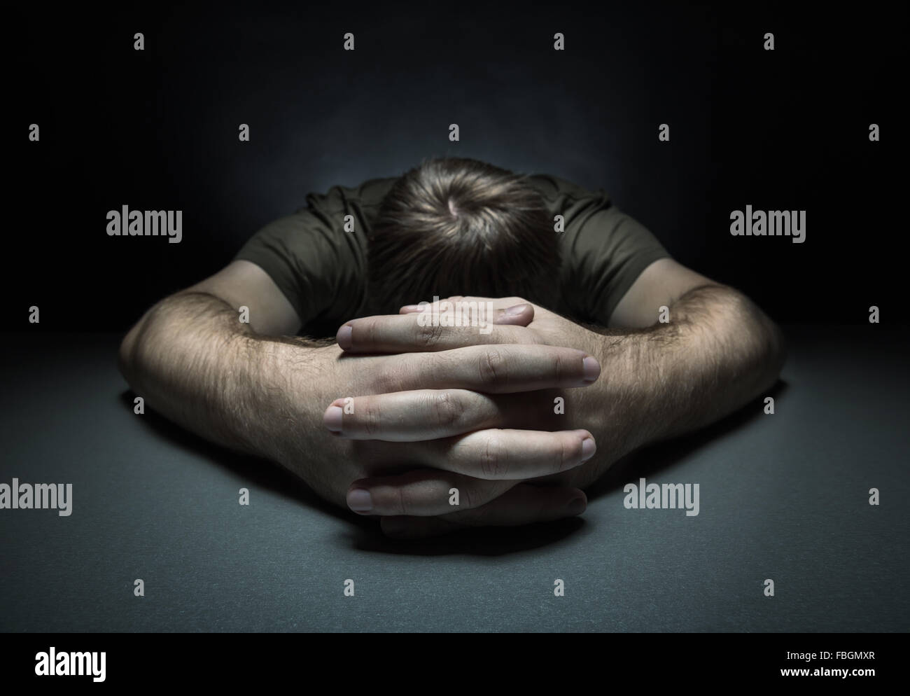 Man sleeping on the table Stock Photo - Alamy