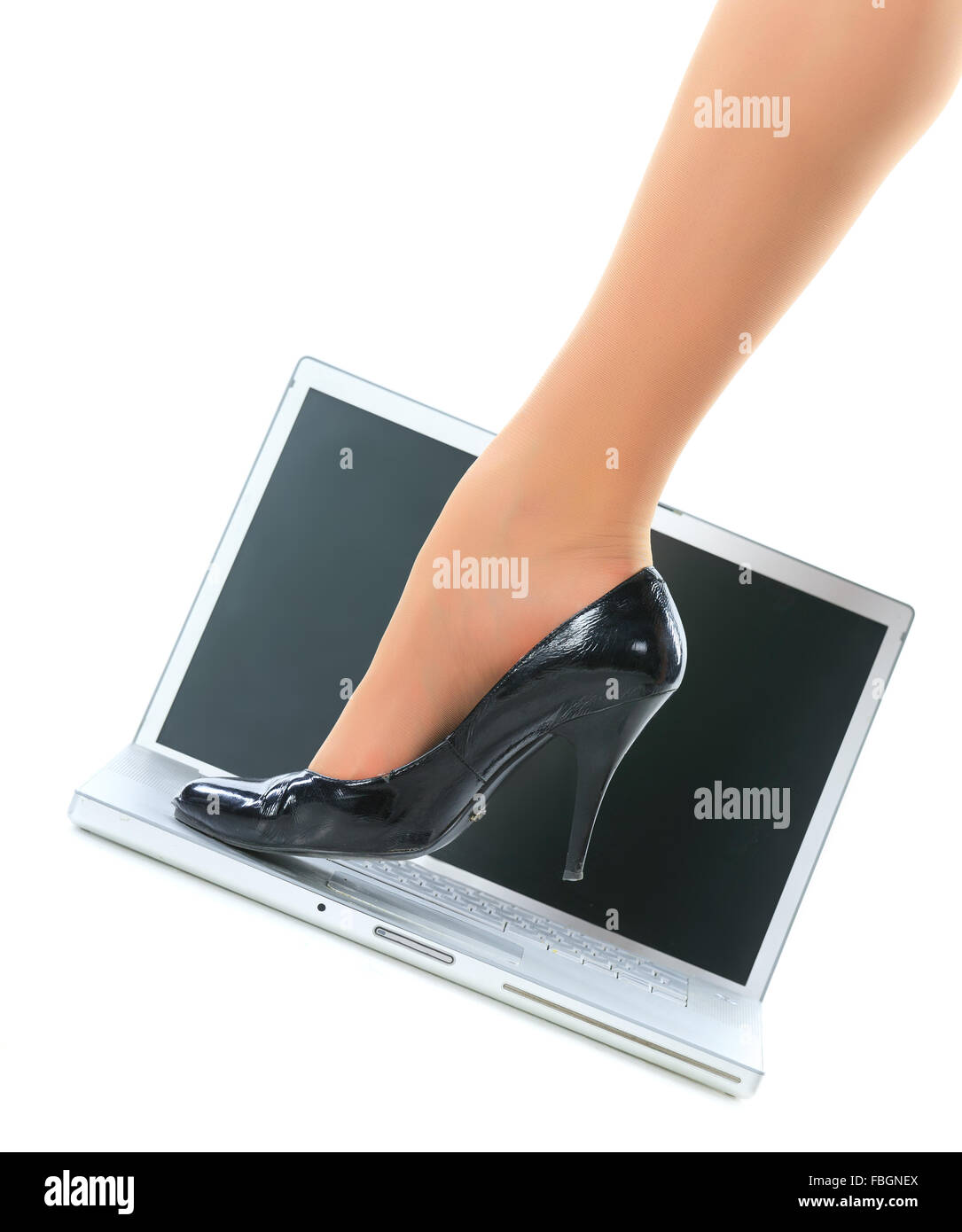 Women's legs and the laptop Stock Photo - Alamy