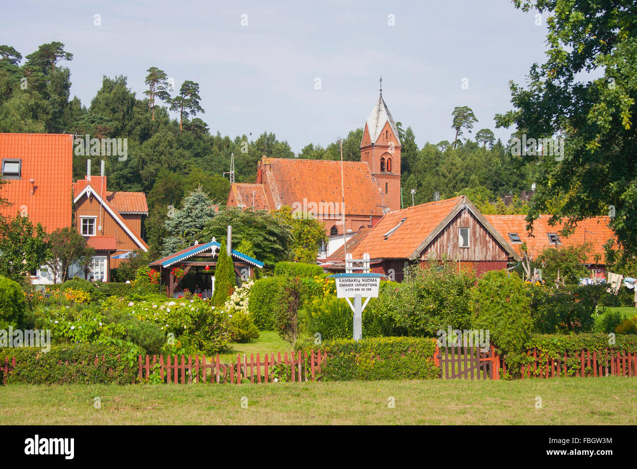 Old Prussian buildings and church in Juodkrante, Lithuania Stock Photo ...