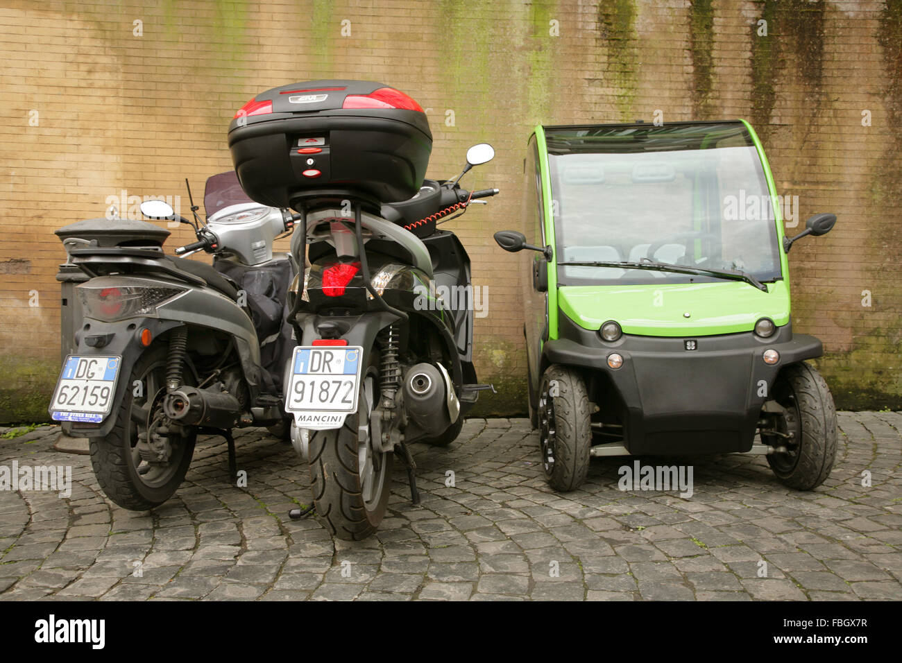 Biro electric microcar and motorscooters, Rome, Italy Stock Photo - Alamy