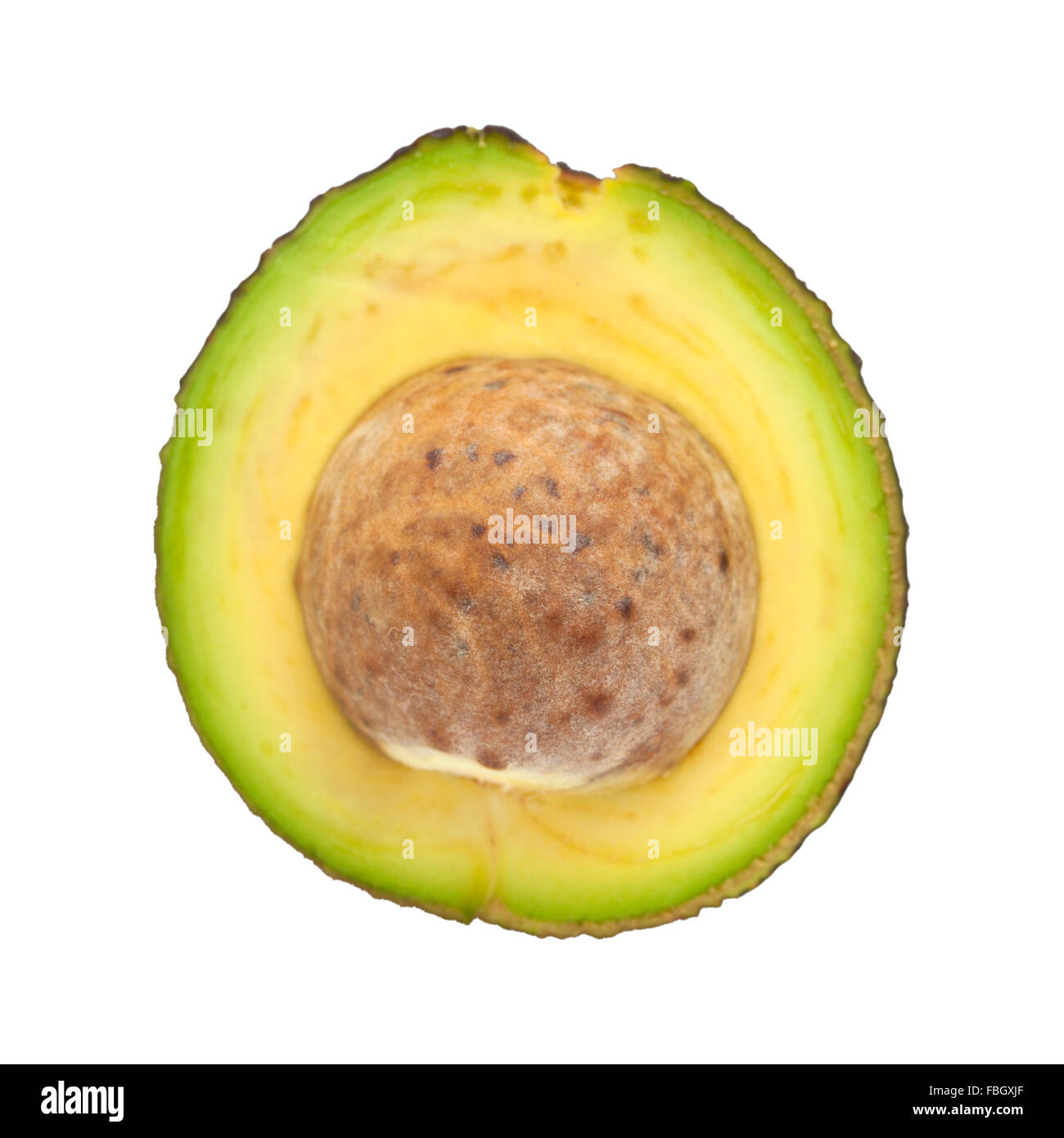 halved round dark skinned avocado pear isolated on white background Stock Photo - Alamy