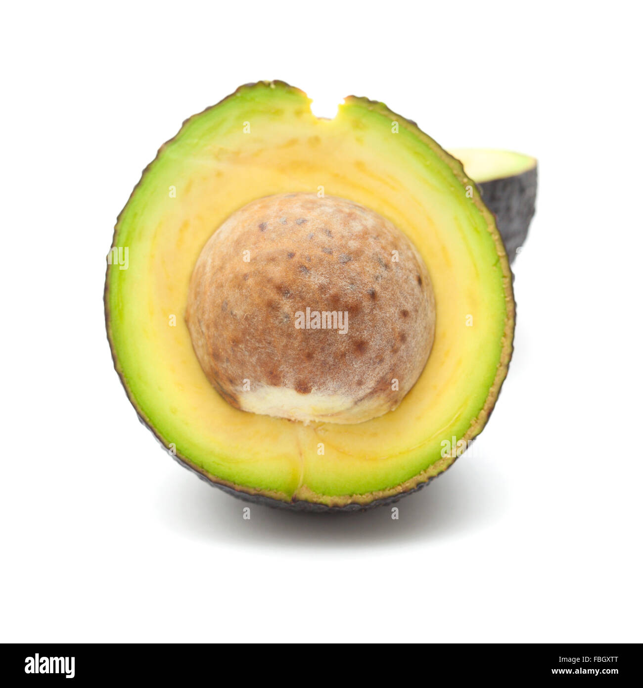 round dark skinned avocado pear isolated on white background Stock ...