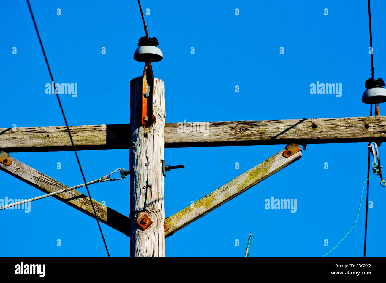 The top crossbar section of a telephone pole or power line post Stock ...