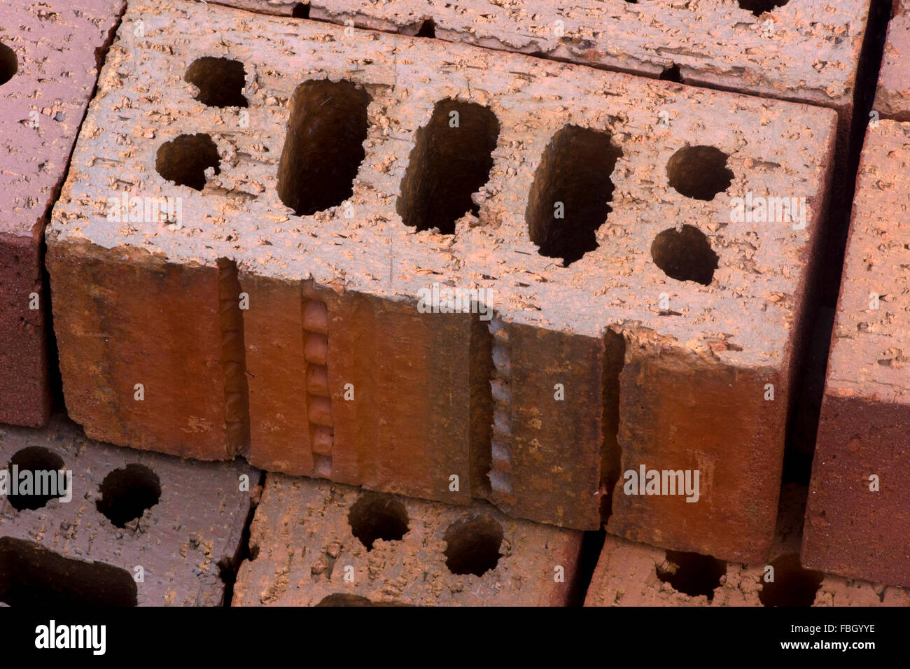 An individual brick, on a palette of brick construction materials Stock ...