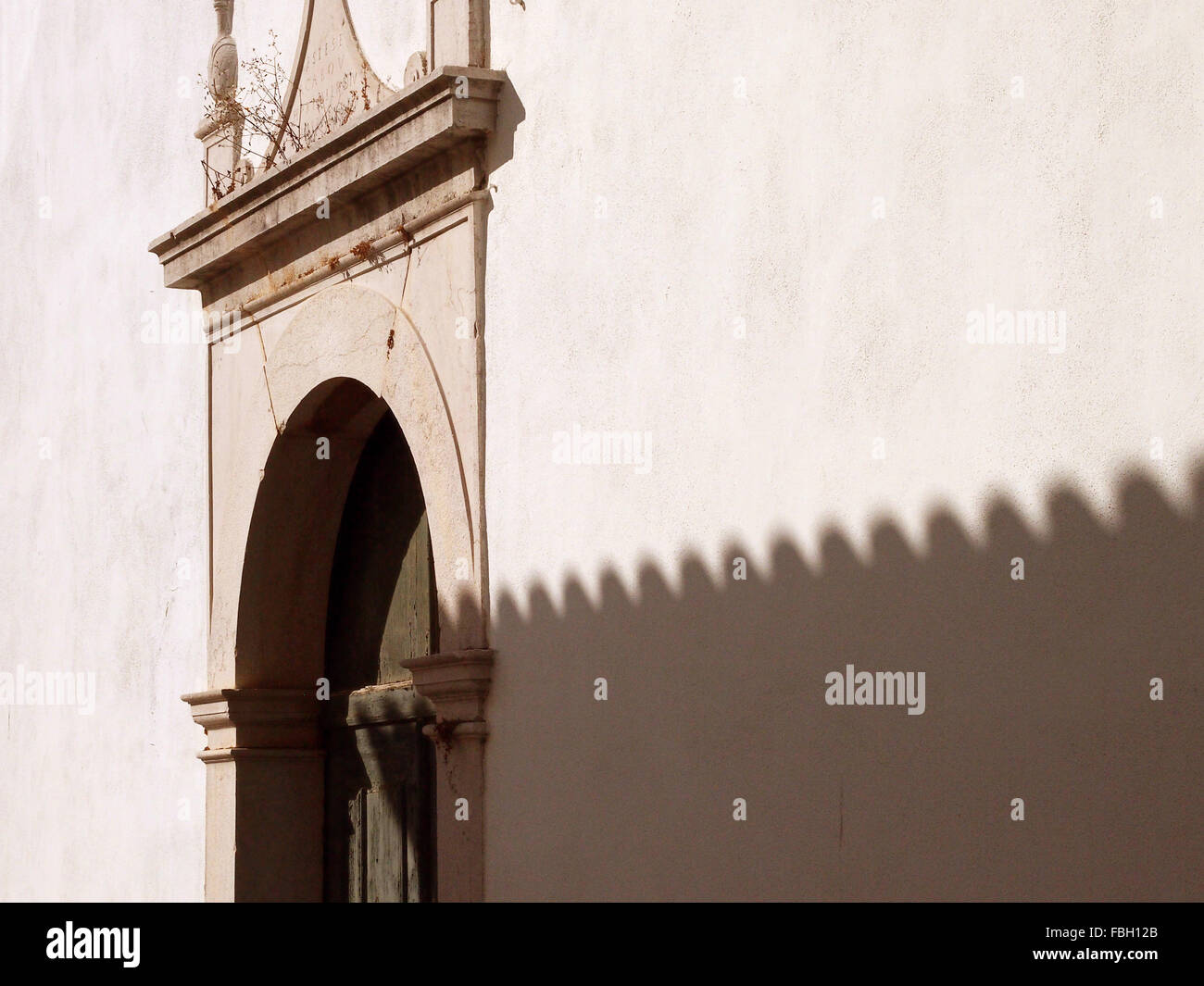 Casting a shadow on doorway Stock Photo - Alamy