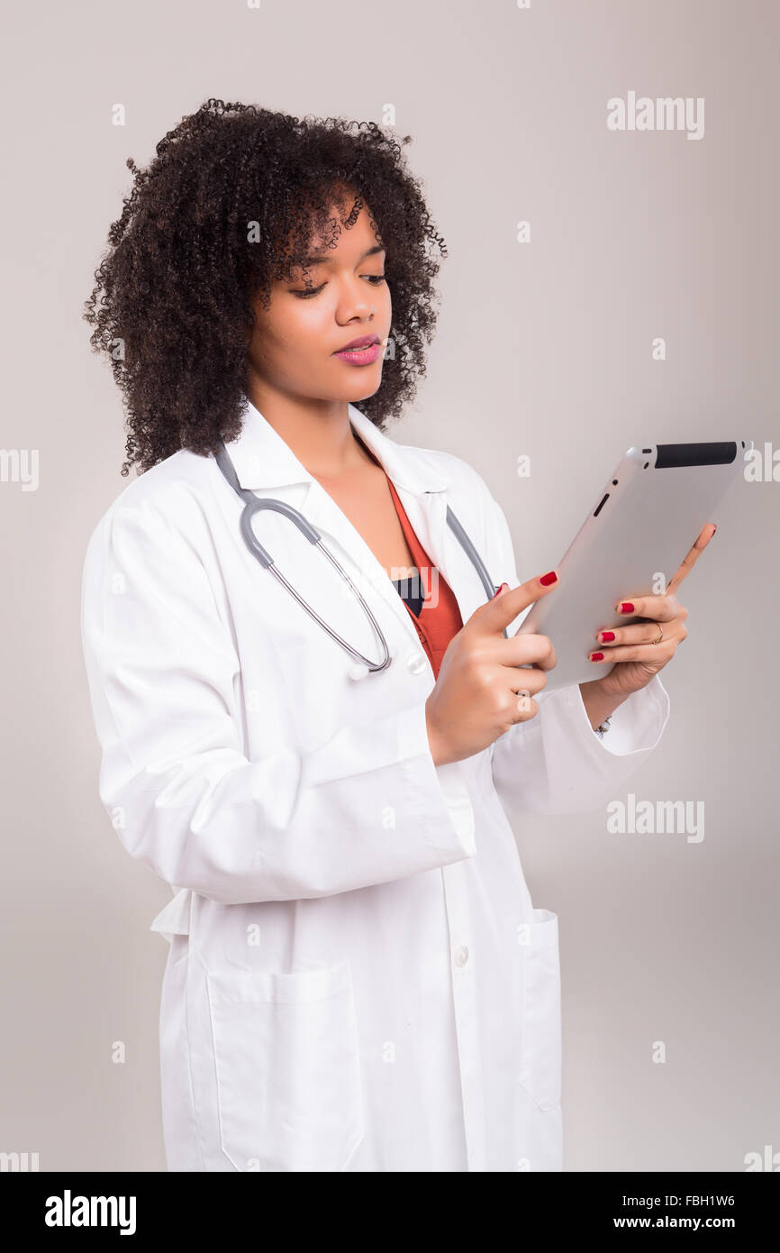 Pretty african american female doctor hi-res stock photography and ...