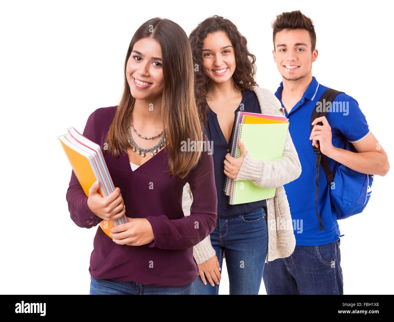 Young happy students posing over white background Stock Photo - Alamy
