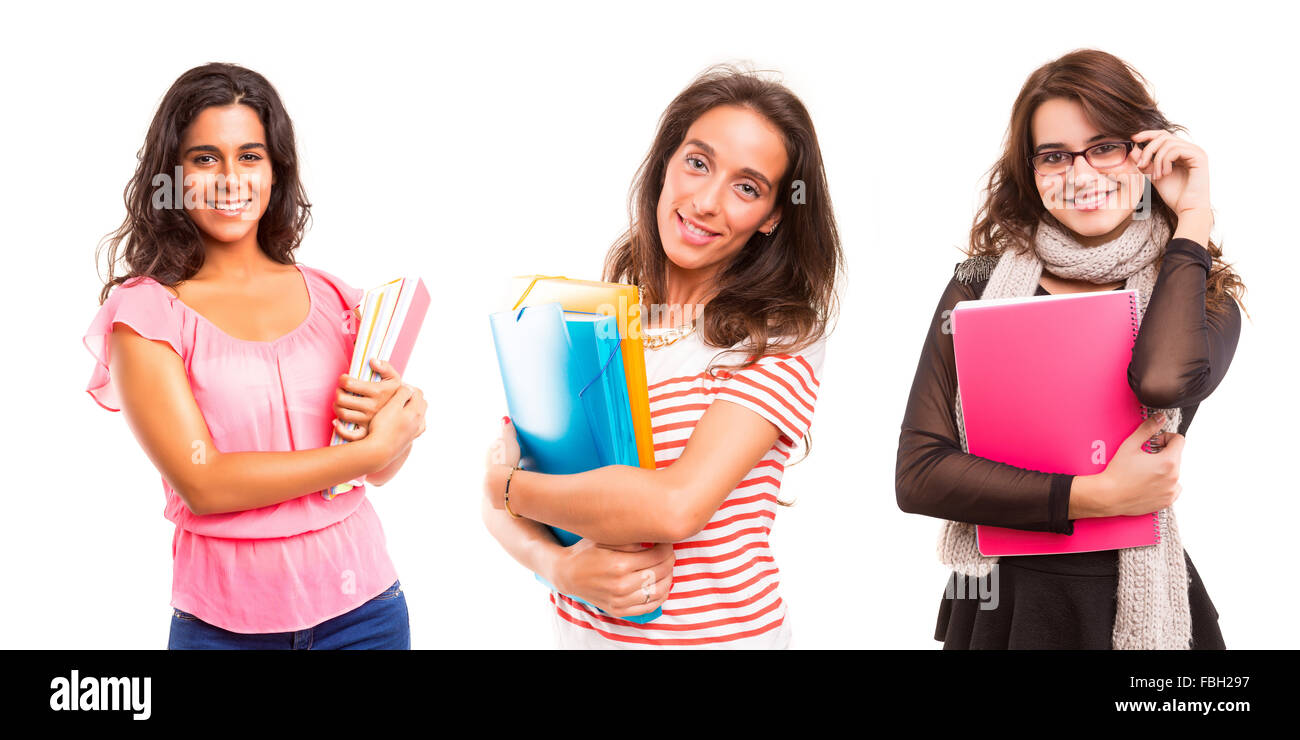 Young happy students posing over white background Stock Photo - Alamy