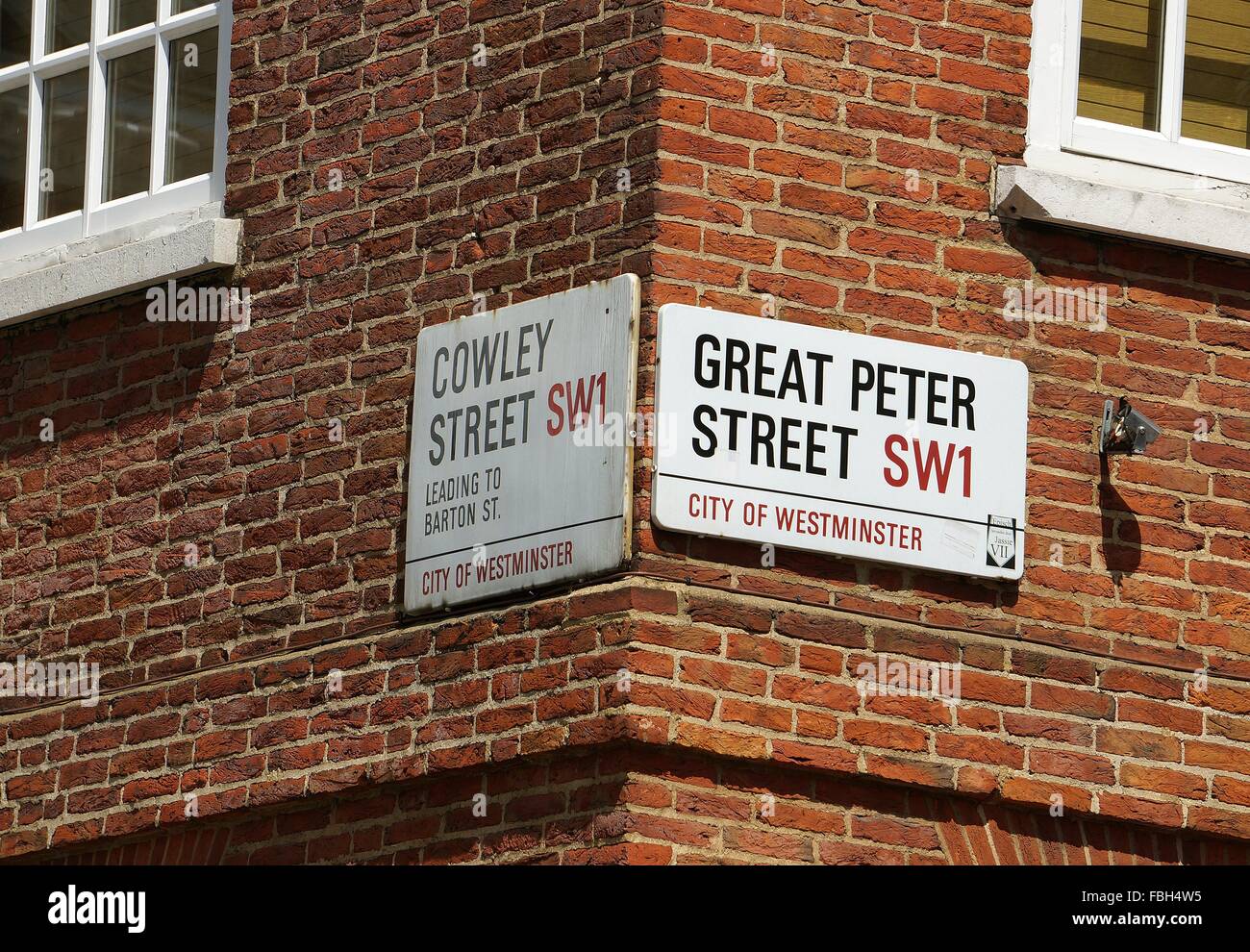 Cowley Street & Great Peter Street signs in the city of London England ...