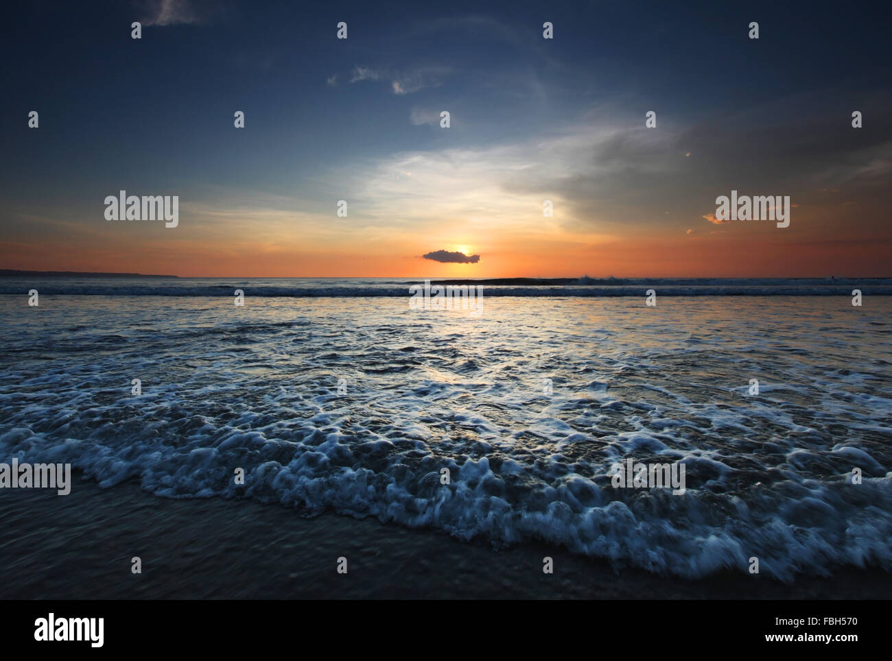 Radiant sea beach sunset on Bali Stock Photo - Alamy