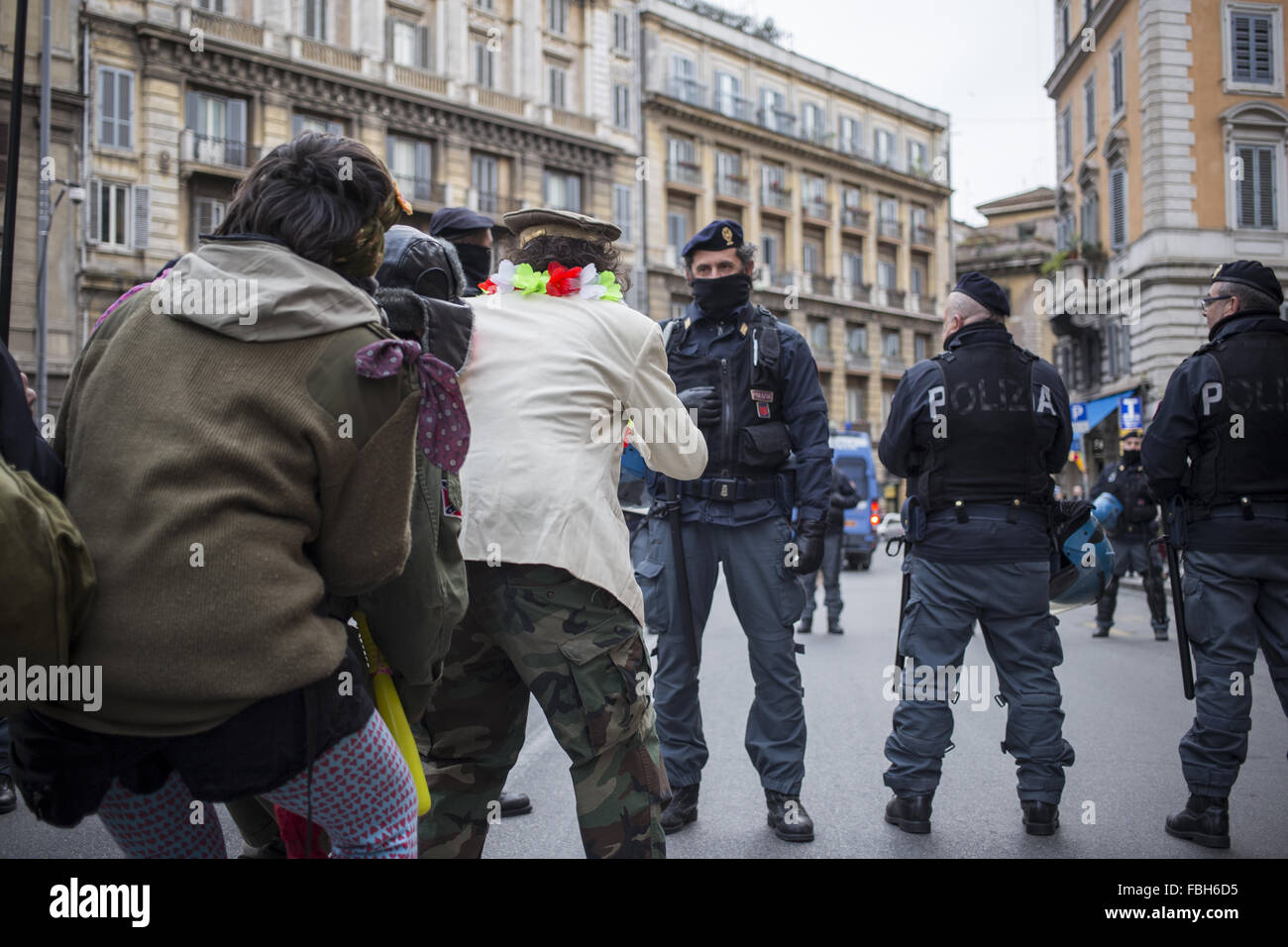 Rome, Italy. 16th Jan, 2016. Riot police warden their selves on the ...
