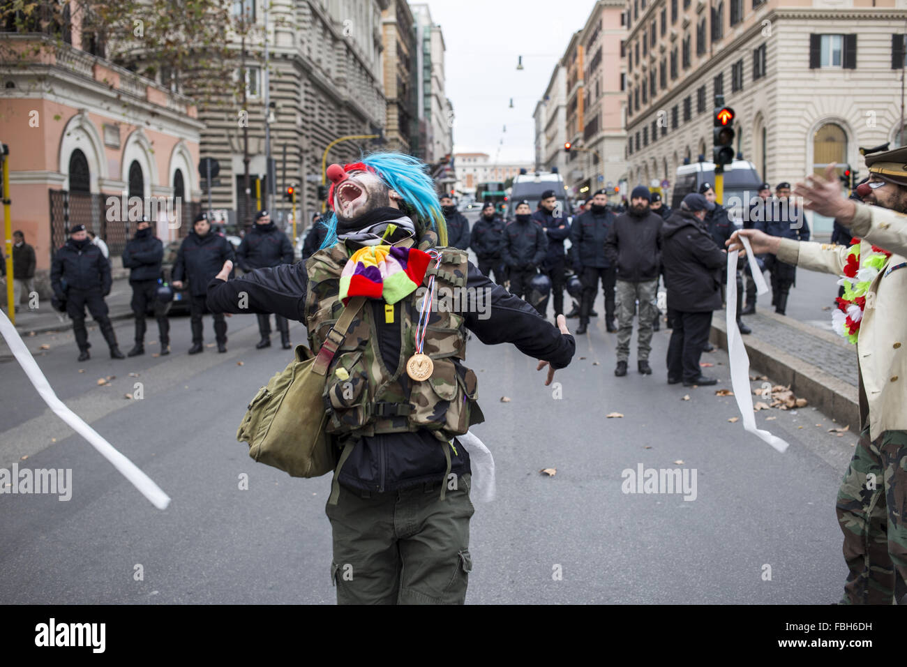 Rome, Italy. 16th Jan, 2016. Riot police warden their selves on the ...