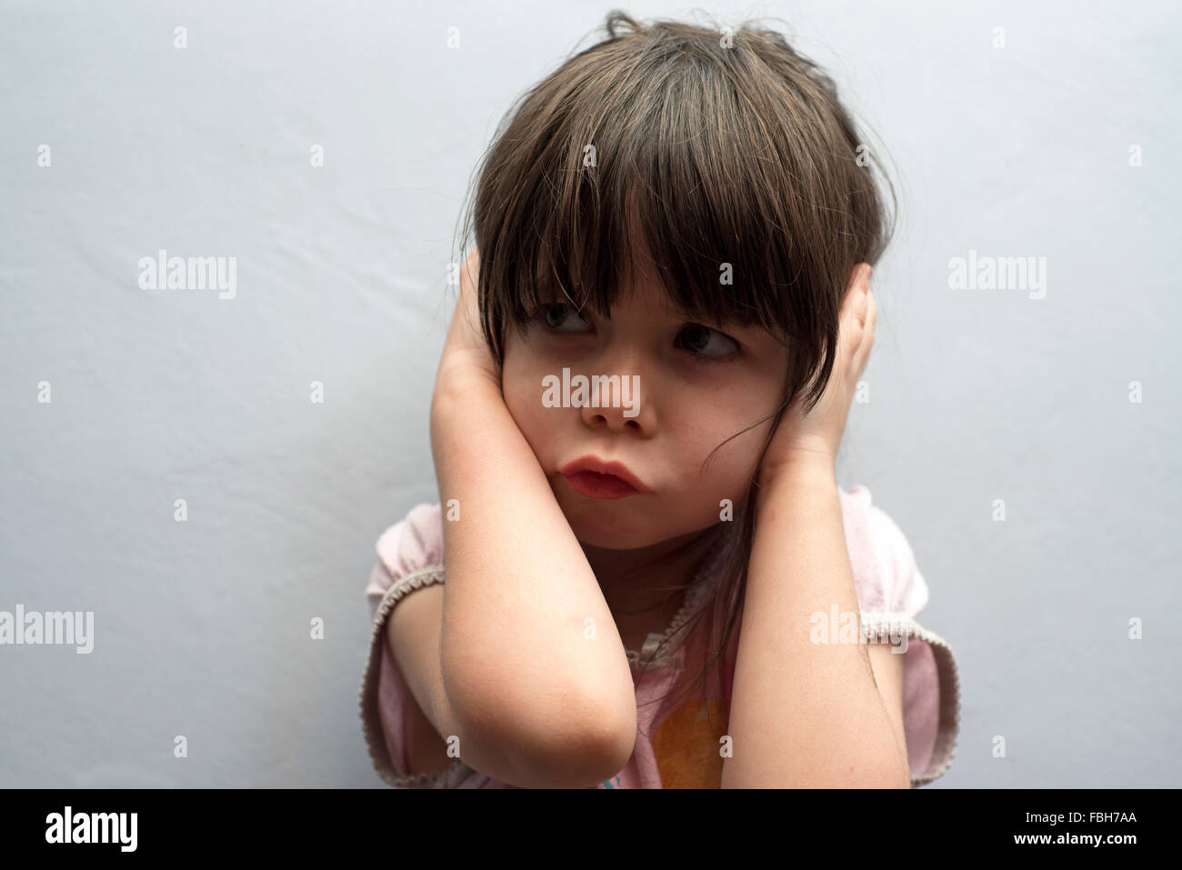 Upset girl listening hi-res stock photography and images - Alamy