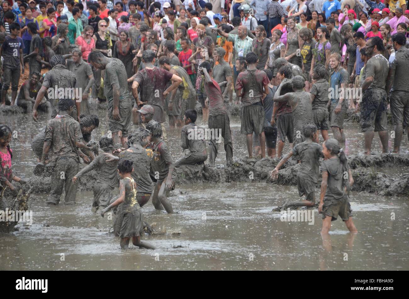 Rice planting festival mud fight Stock Photo - Alamy