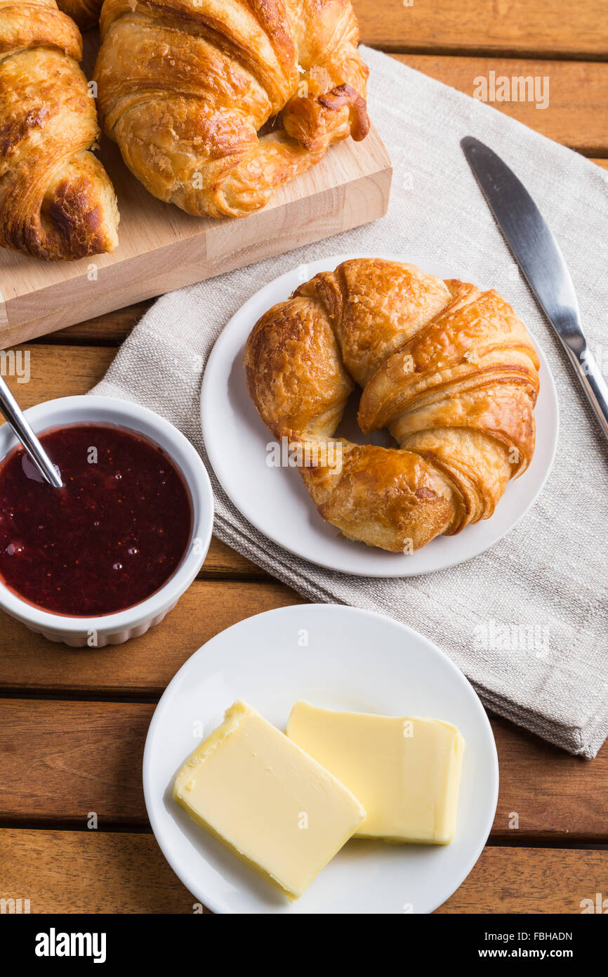 Croissants with butter and jam Stock Photo - Alamy