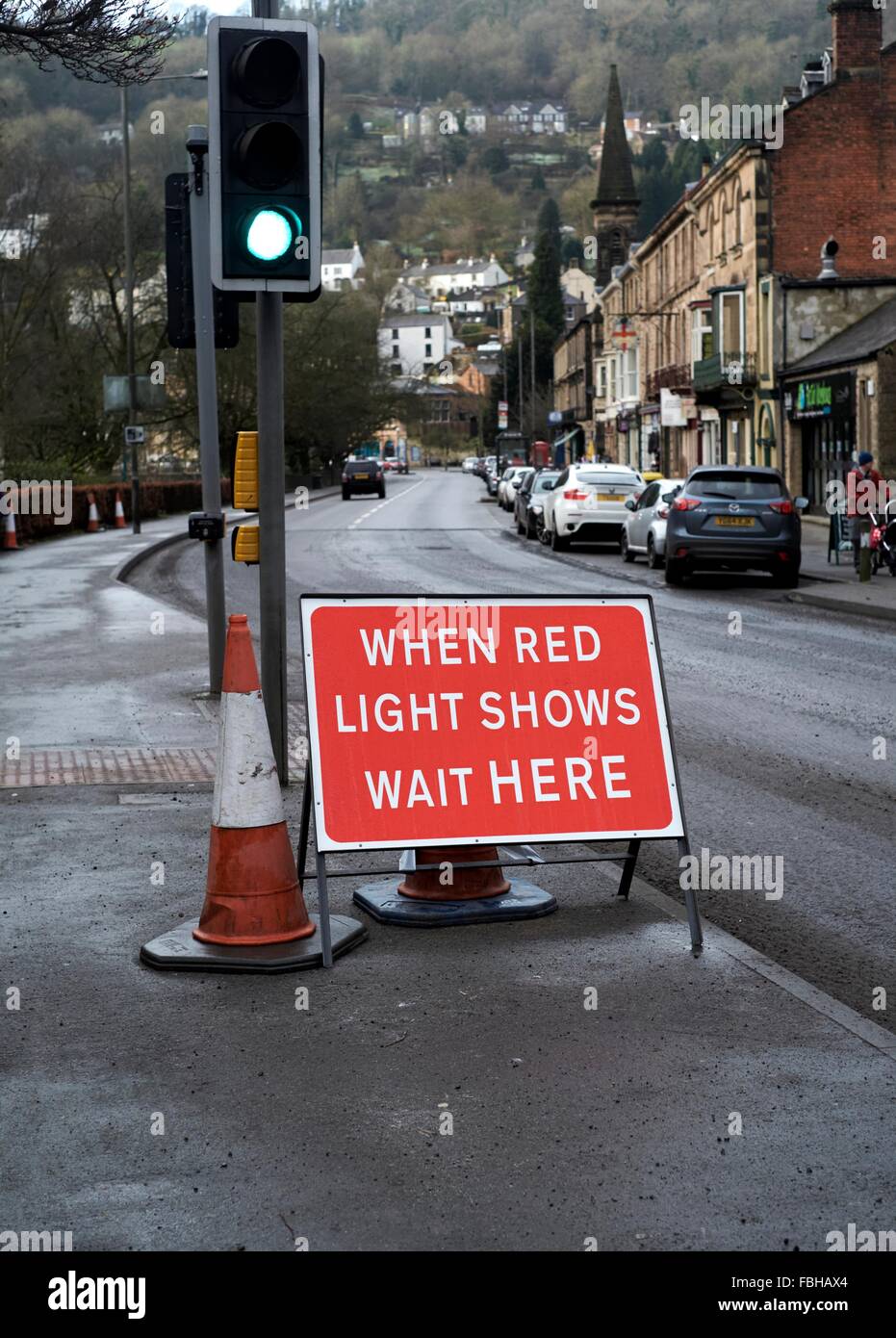 When red light shows wait here sign hi-res stock photography and images ...