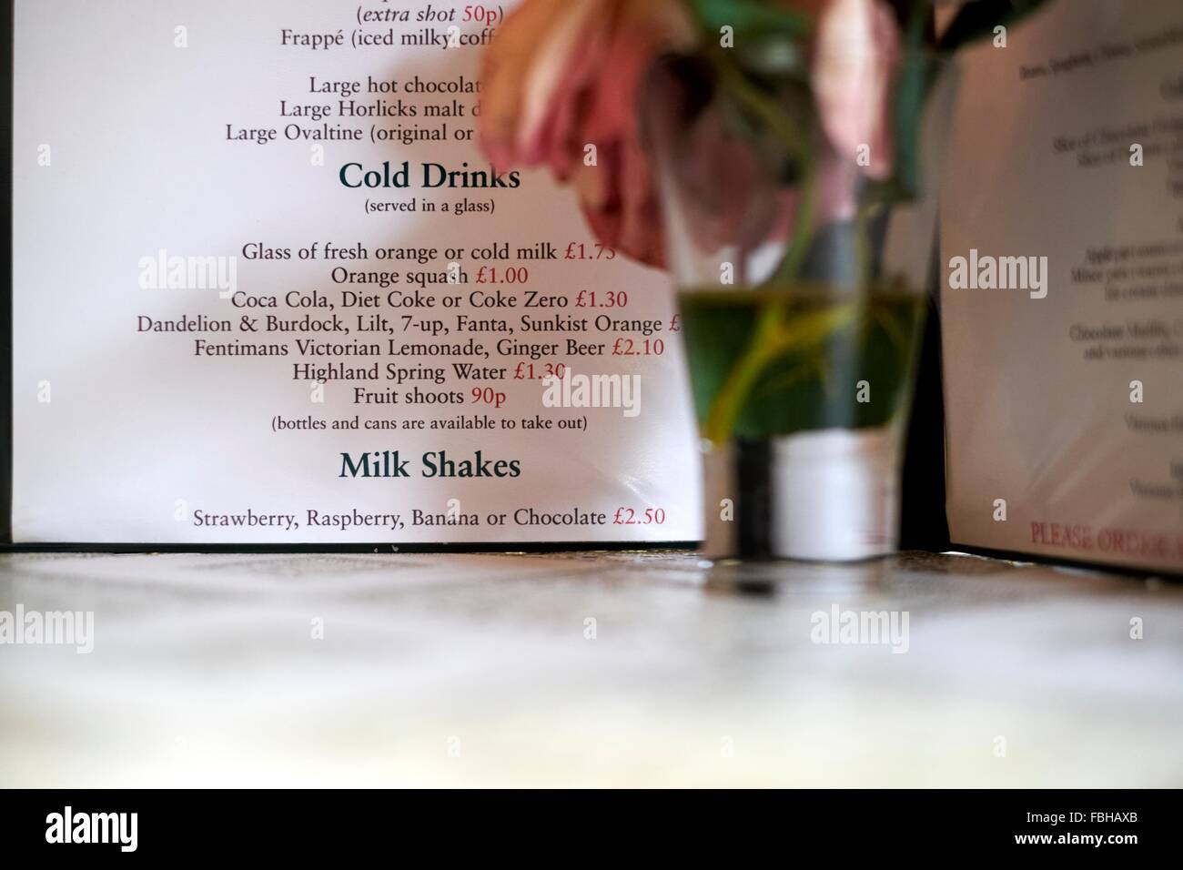 An english cafe table menu for cold drinks in a uk town Stock Photo - Alamy