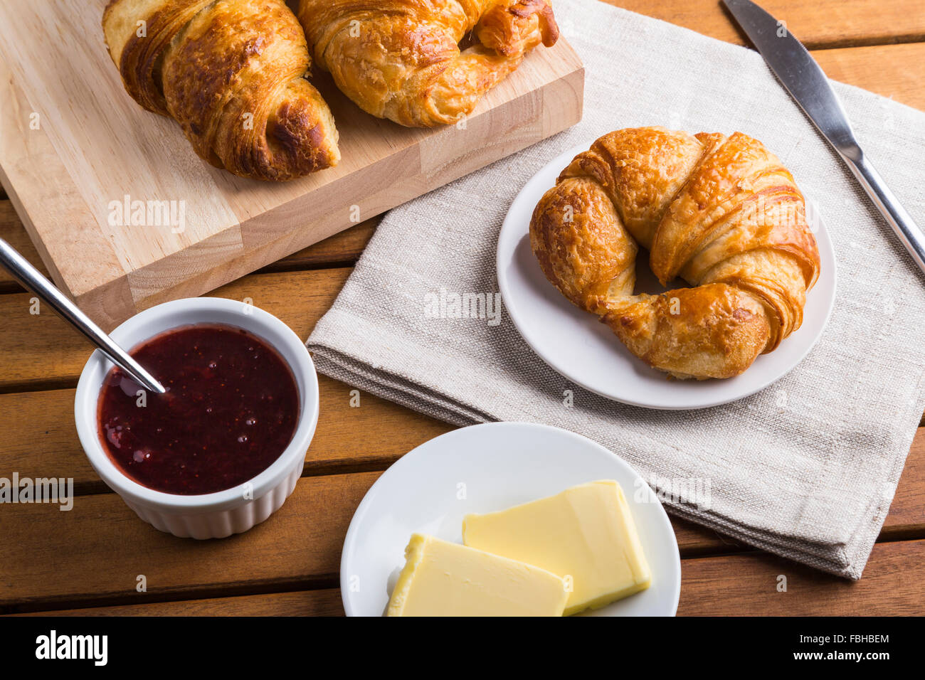 Croissant platter with jam and butter Stock Photo - Alamy