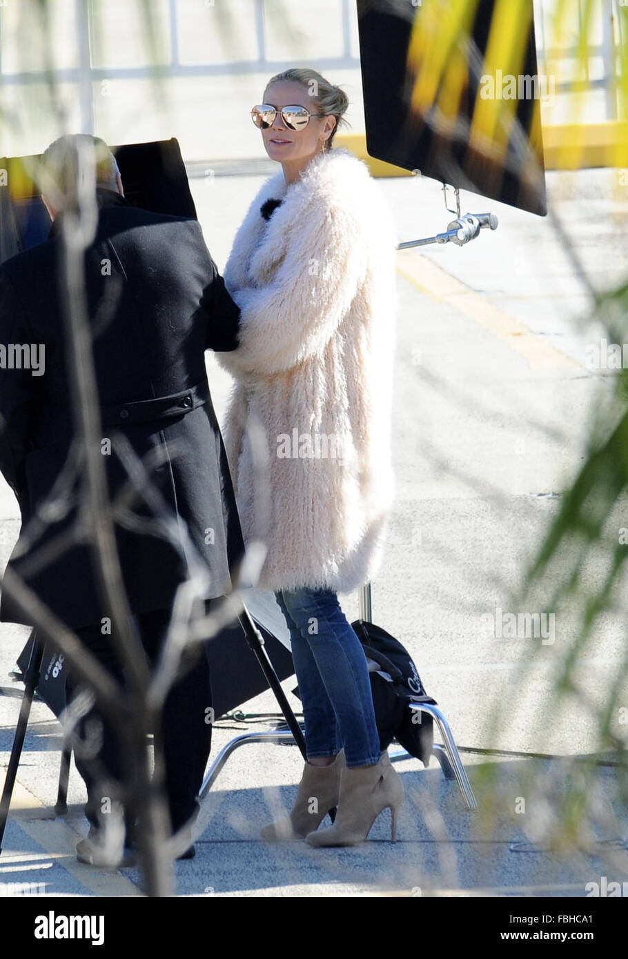 Super Model Heidi Klum sports a mink coat while filming scenes and ...