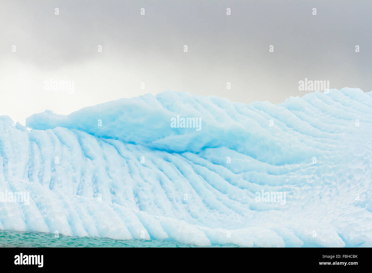 Massive blue ice glacial wall on Antarctica Peninsula Stock Photo - Alamy