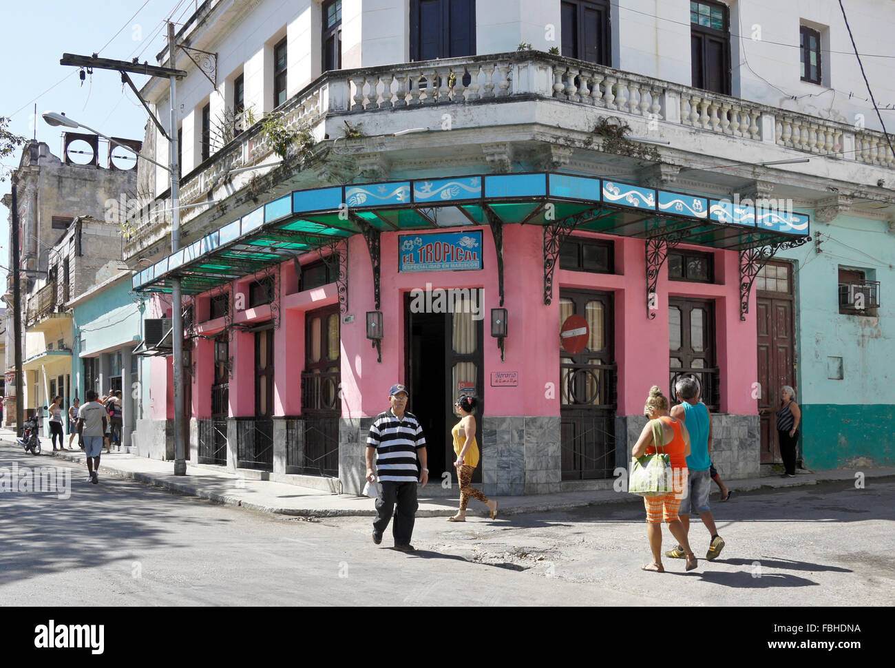 Restaurant and people in downtown area of Regla, Cuba Stock Photo - Alamy