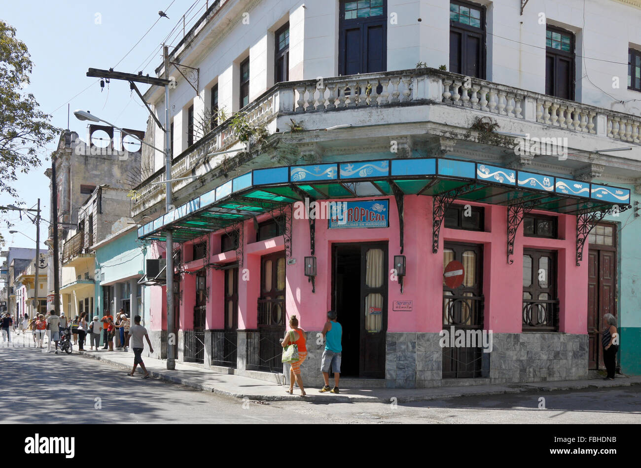 Restaurant and people in downtown area of Regla, Cuba Stock Photo - Alamy