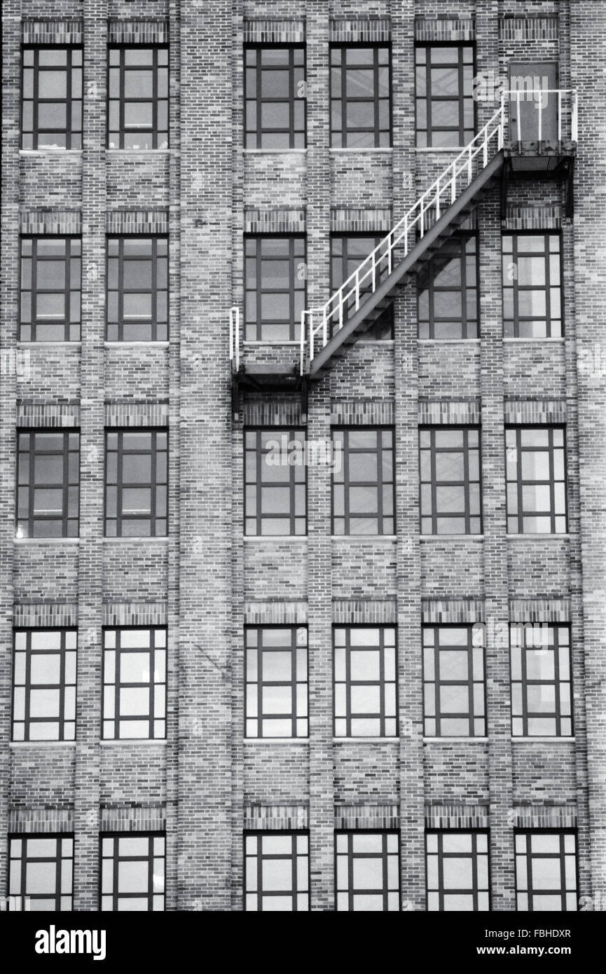 Side of building with external staircase Stock Photo - Alamy