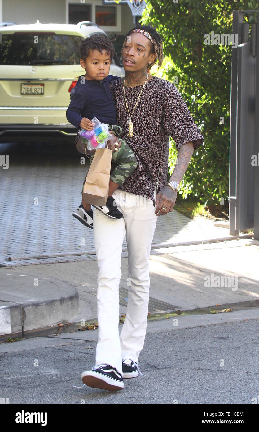 Amber Rose dressed in a FVCKA jogging suit, takes her son to the park ...