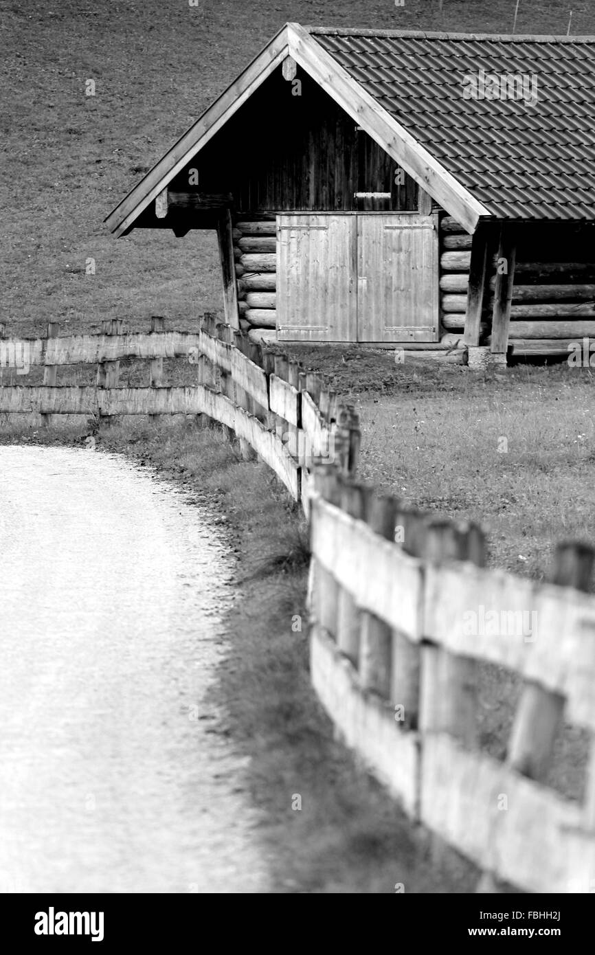 Hut, fence, path, b/w Stock Photo - Alamy