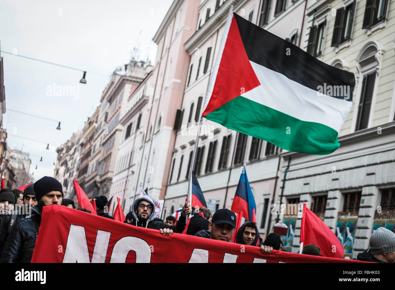 Rome, Italy. 16th Jan, 2016. Anti war protesters hold banners and wave ...