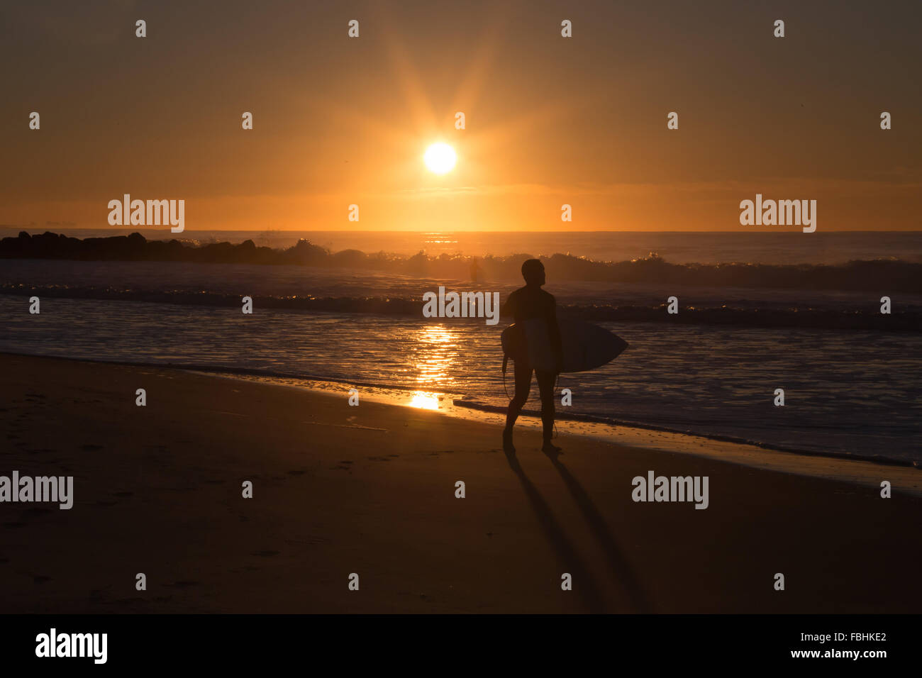 Early morning surf session in Rockaway Beach, Queens, New York ...