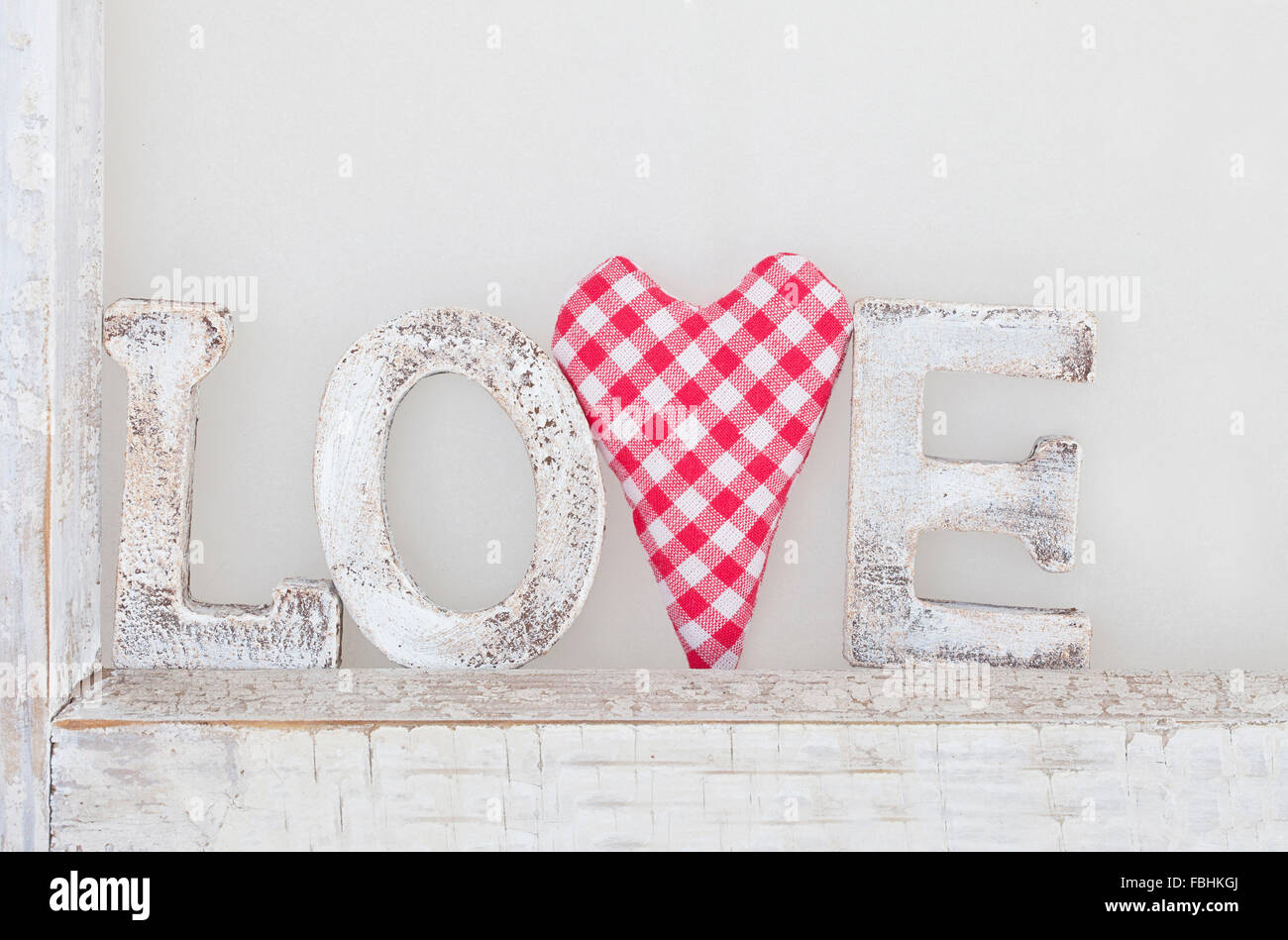 Writing 'Love' with heart Stock Photo - Alamy