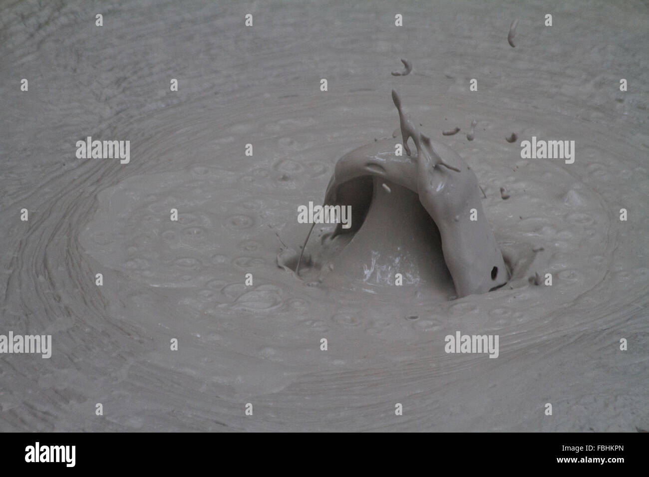Bursting mud bubble at the volcano Stock Photo - Alamy