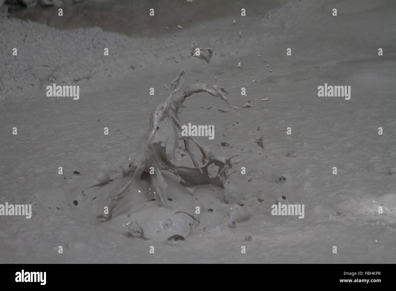 Bursting mud bubble at the volcano Stock Photo - Alamy