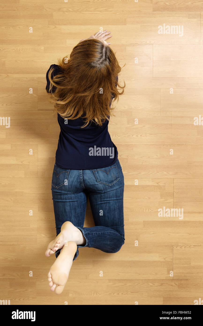 Lady lying on her front, taken from the back Stock Photo - Alamy