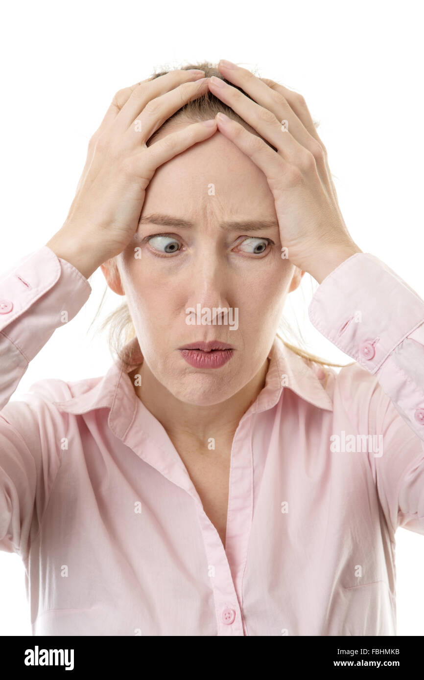portrait of woman looking worried and shocked shot in the studio Stock ...