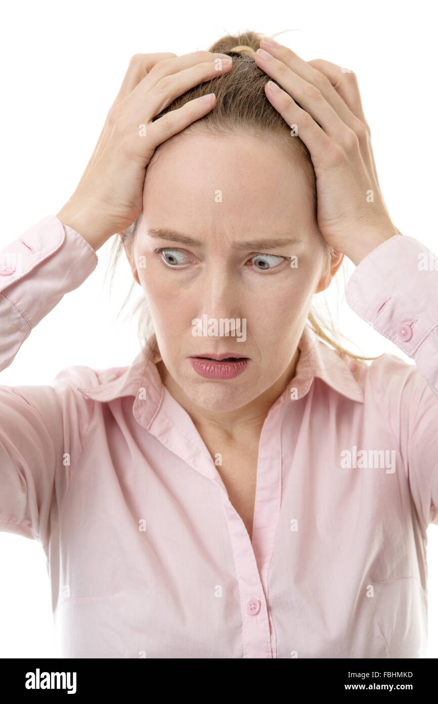 portrait of woman looking worried and shocked shot in the studio Stock ...