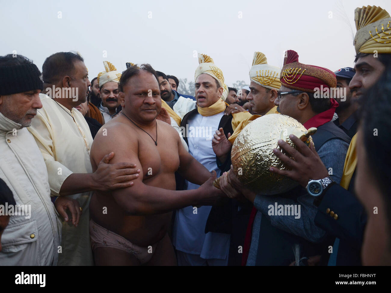 Lahore, Pakistan. 16th Jan, 2016. A wrestler receiving his award during ...