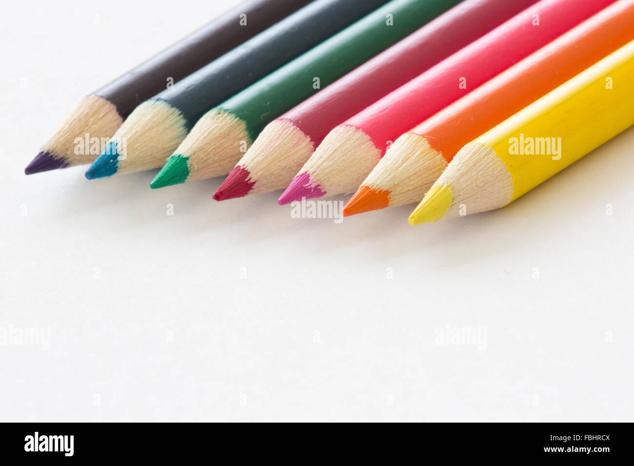 Colored pencils on a white background Stock Photo - Alamy