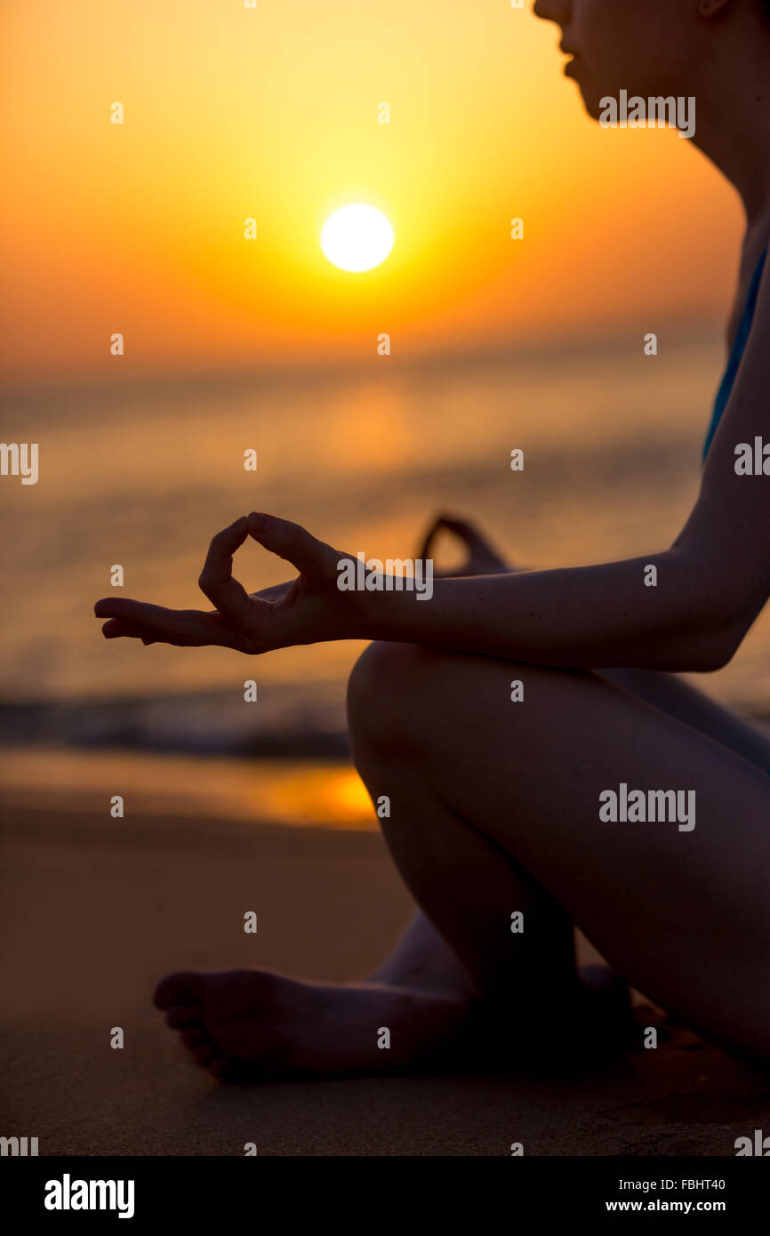 Cross legged meditating mudra yoga hi-res stock photography and images ...