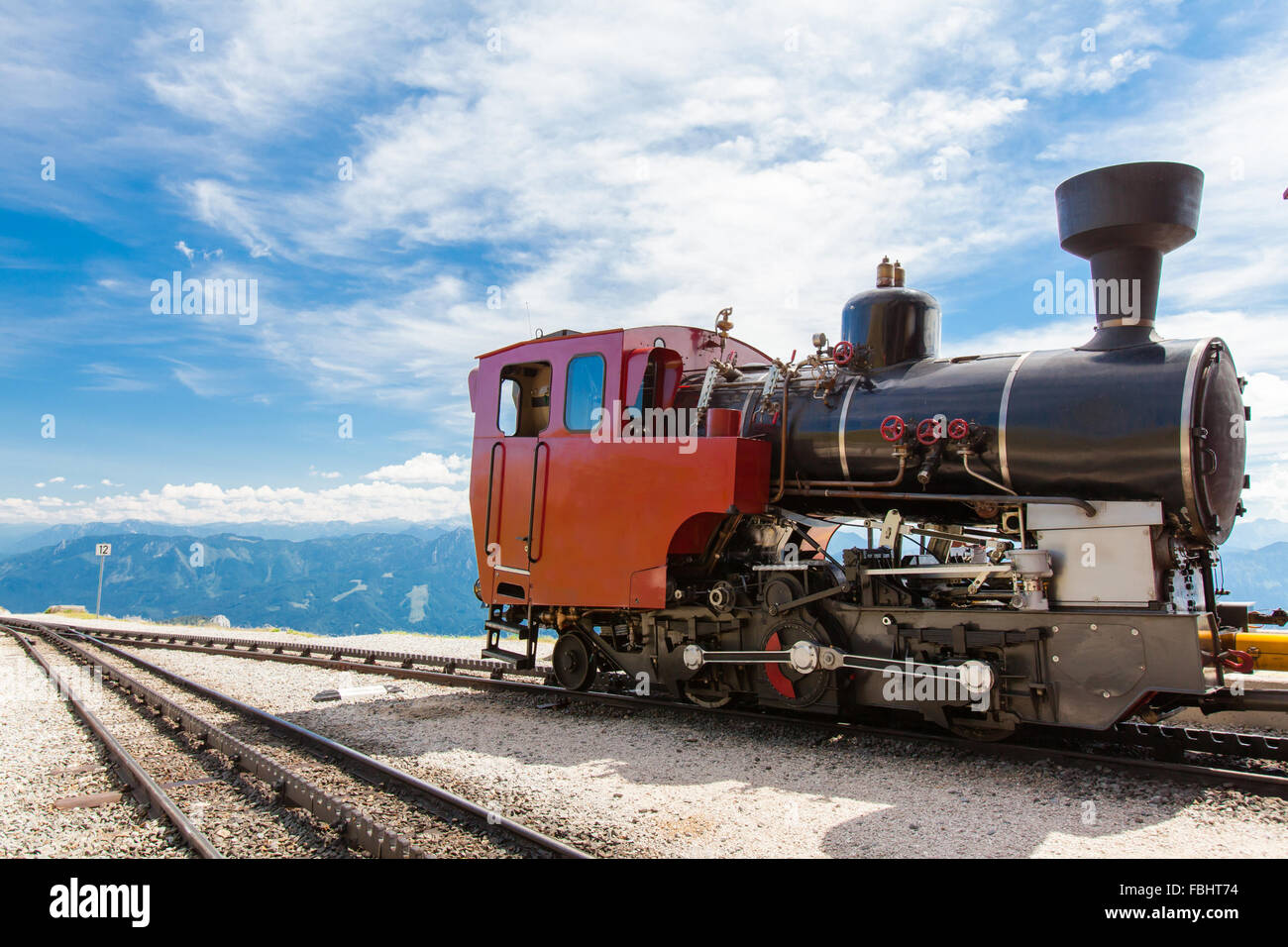 The steam train takes tourists on a mountain peak in the Austrian Alps ...