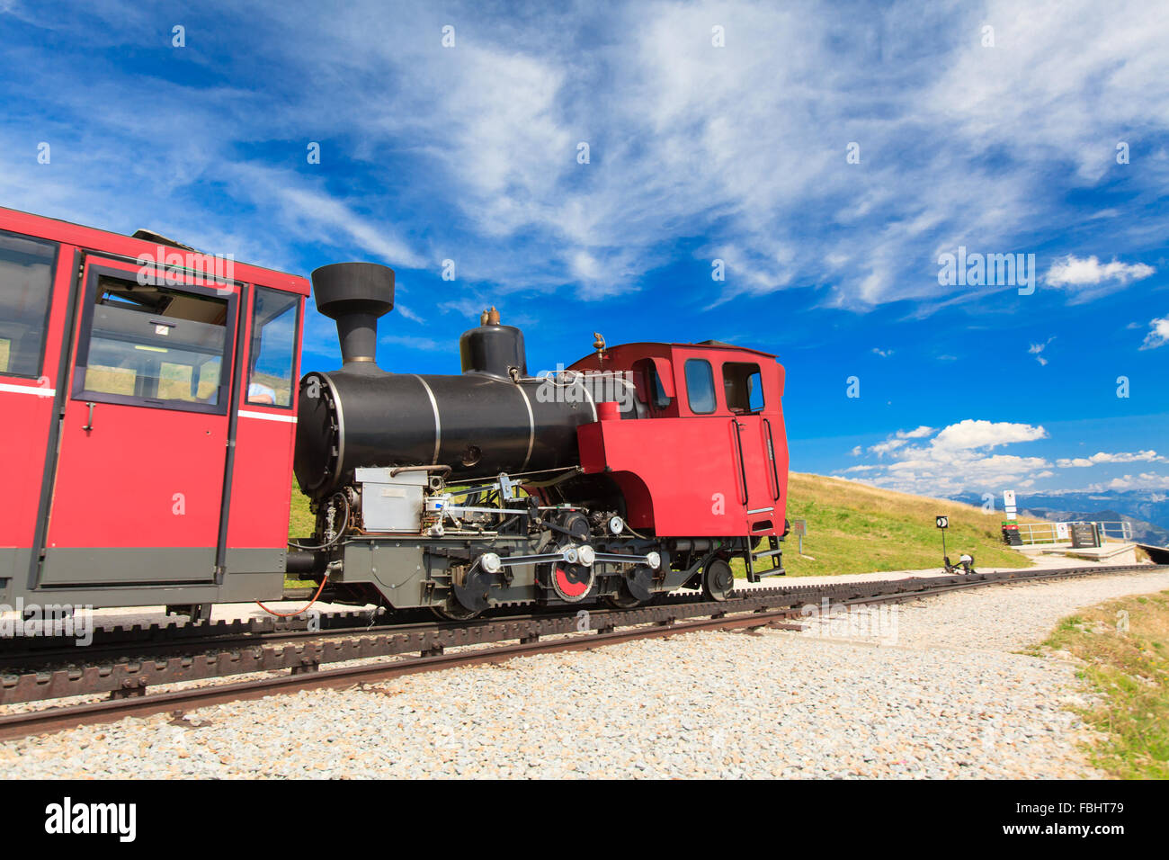 The steam train takes tourists on a mountain peak in the Austrian Alps ...