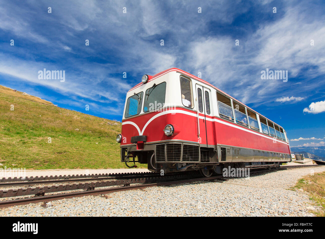 The steam train takes tourists on a mountain peak in the Austrian Alps ...