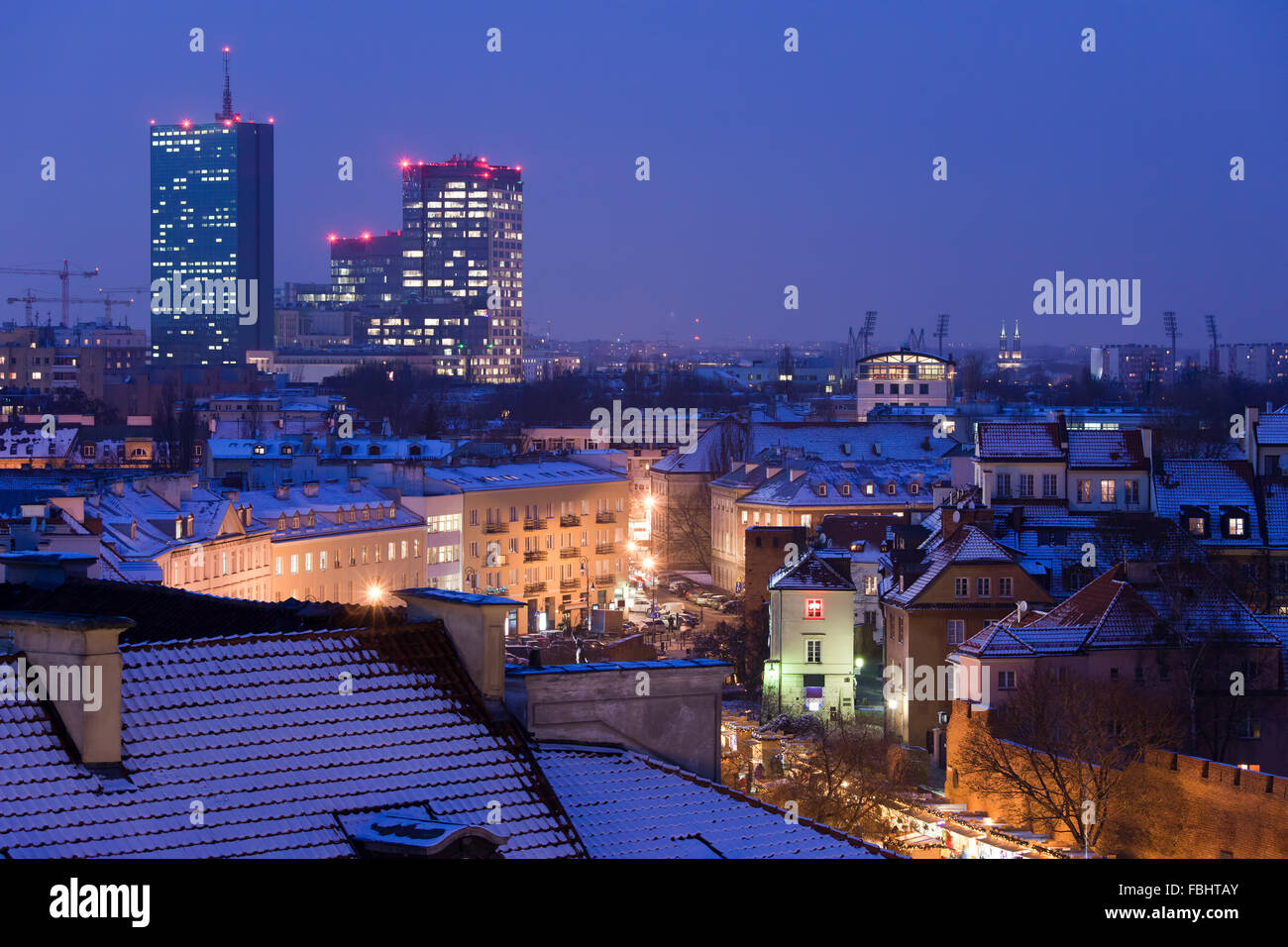 City of Warsaw winter cityscape in Poland at night on border of Old ...