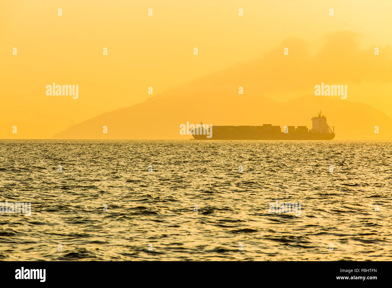 Ship sailing at the ocean Stock Photo - Alamy