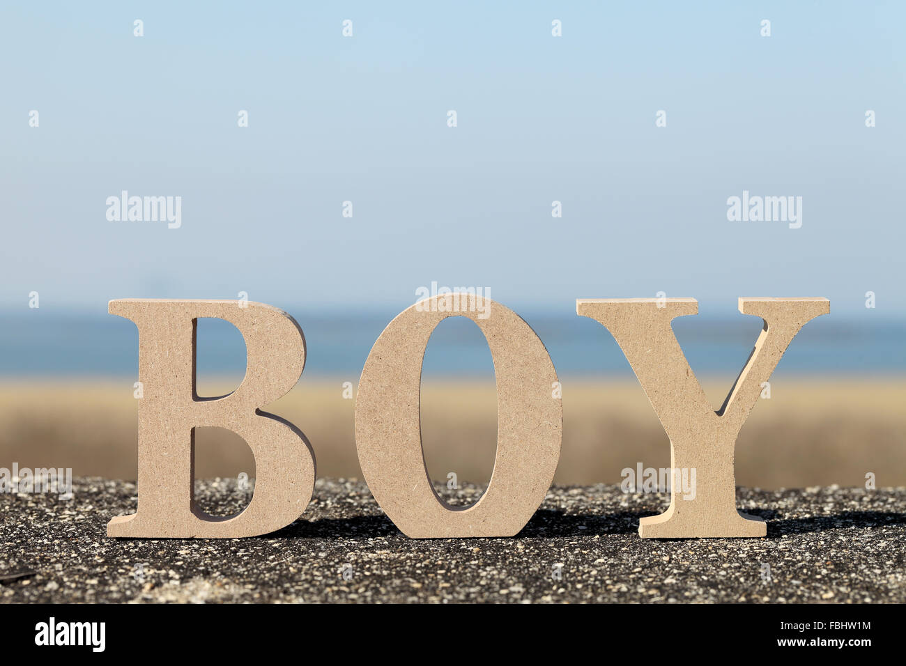 Word boy made with wooden block wooden letters Stock Photo - Alamy