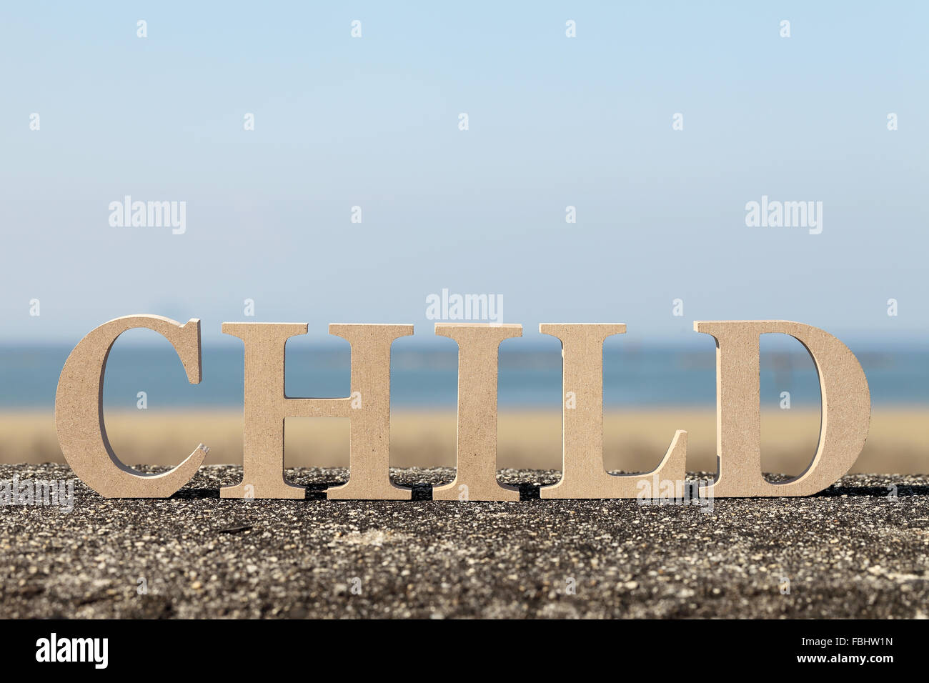 Word child made with wooden block wooden letters Stock Photo - Alamy
