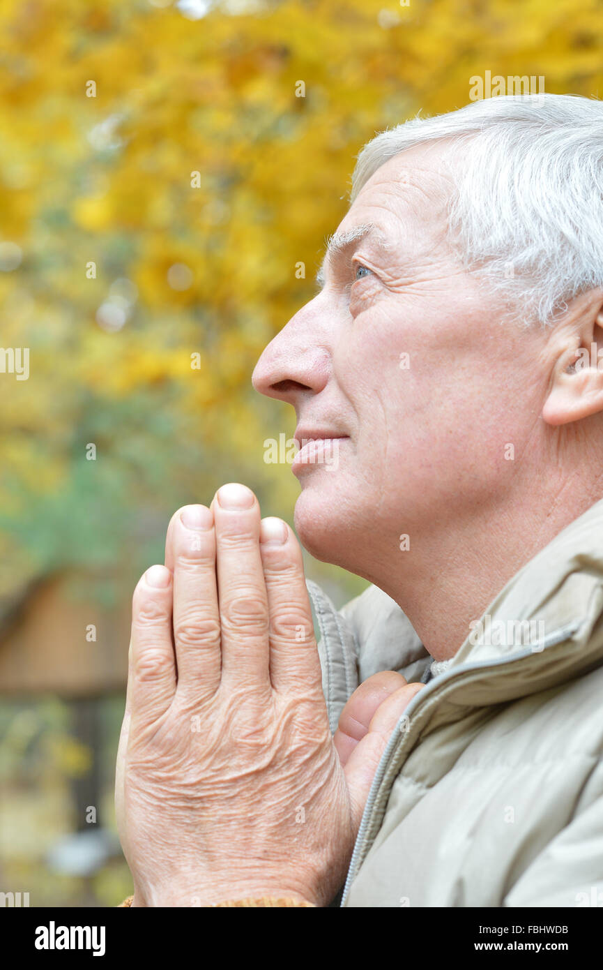 Senior man thinking Stock Photo - Alamy