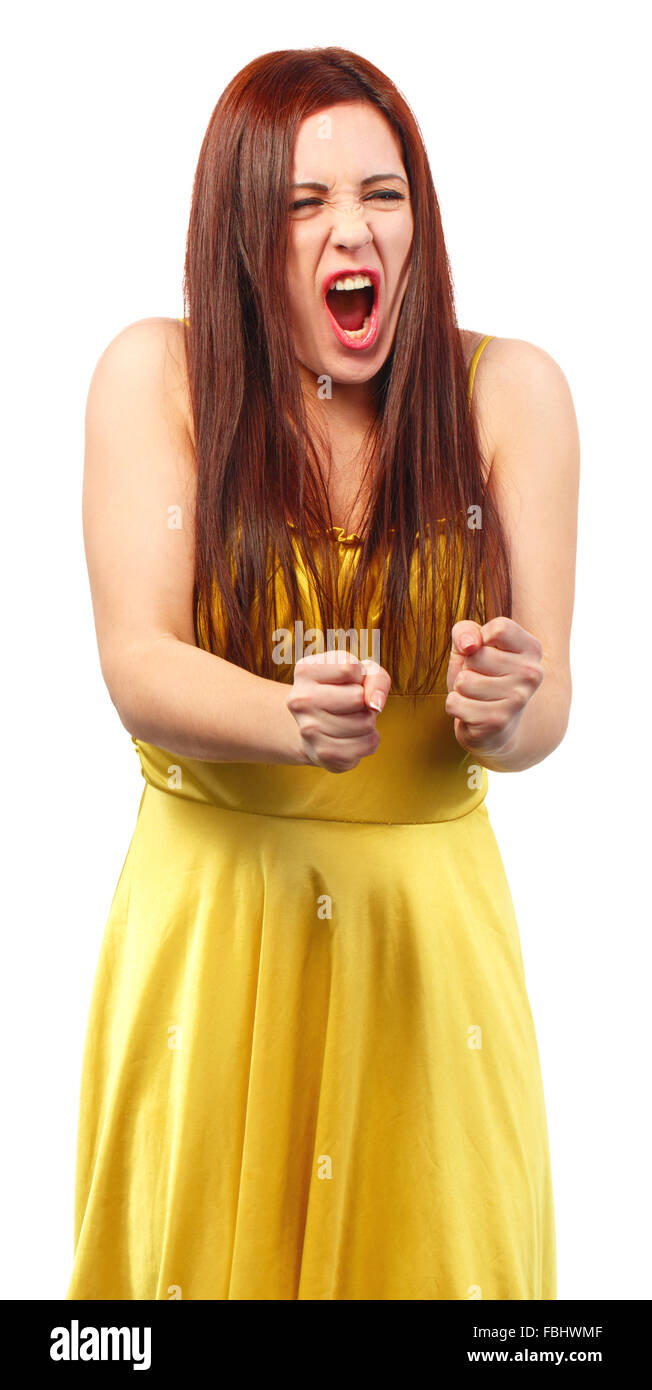 Portrait of a screaming woman in yellow dress isolated on white ...